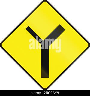 Irish road warning sign - 4-way Intersection ahead Stock Photo - Alamy