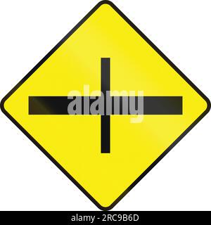Irish road warning sign - 4-way Intersection ahead Stock Photo - Alamy