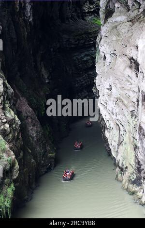 CHONGQING, CHINA - JULY 13, 2023 - Tourists take a boat to cross the ...