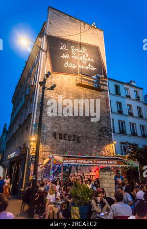 Busy outdoor bar at the Cabaret Populaire Culture Rapide and Il faut se ...