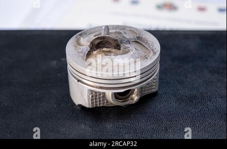 Broken connecting rod and engine piston isolated on white background ...