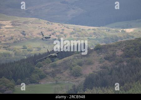 Hercules passing through Mach Loop Stock Photo - Alamy