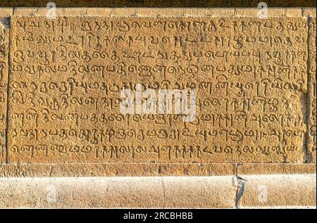 Stone Inscriptions of Tamil language carved on the exterior stone walls ...