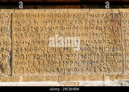 Stone Inscriptions of Tamil language carved on the exterior stone walls ...