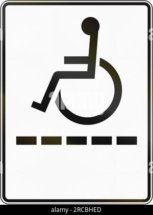 A Road sign in Canada - Disabled parking by permit only. This sign is ...