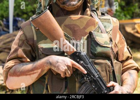 Soldier with assault rifle. Military volunteer. Military legionary ...