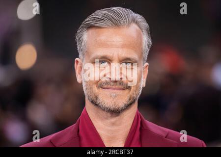 Mate Haumann poses for photographers upon arrival at the premiere for ...