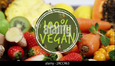 Composite of 100 percent vegan text over fruit and vegetables Stock ...