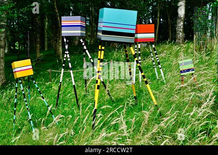 John Elliot - Picnic - Brightly coloured cuboid objects on legs Stock ...