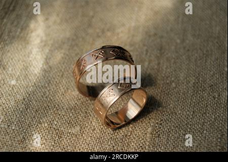 Latvian ancient symbols. Gold wedding rings with ancient symbols. Rings ...