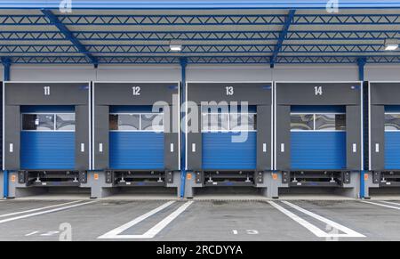 Loading Ramps Dock Doors at Distribution Warehouse Stock Photo - Alamy