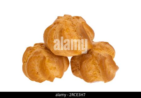 Single profiterole on a plate, isolated, white background Stock Photo ...