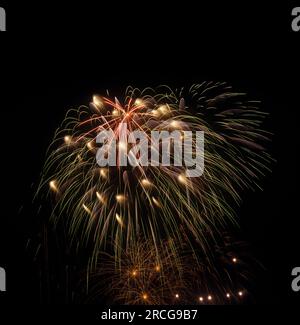 Low Angle View of firework display against black sky Stock Photo - Alamy