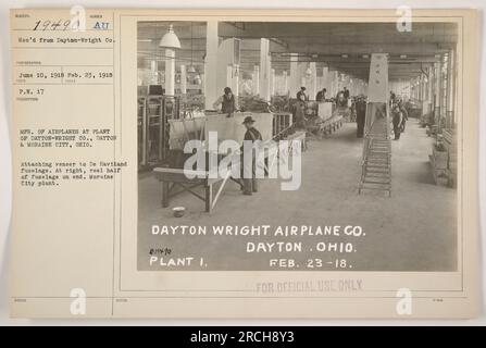 The image shows a De Haviland fuselage at the Dayton-Wright Co. plant ...