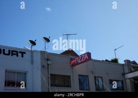 Two big satellite antennas in green nature Stock Photo - Alamy