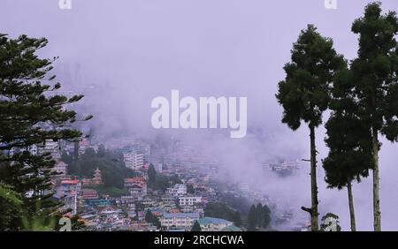 panoramic view of misty and cloudy darjeeling hill station and himalaya ...