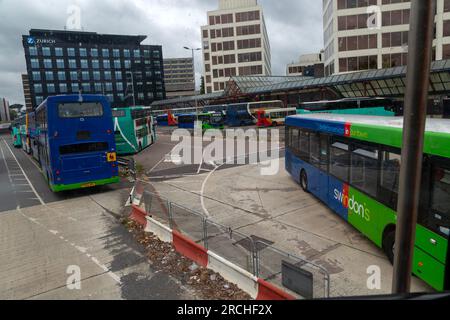 View through bus window of single-decker buses in town centre, Swindon ...