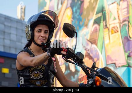 A woman driving the Harley Davidson which is rear in Lebanon Stock ...