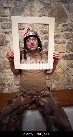 Mad army soldier screaming while looking at camera Stock Photo - Alamy