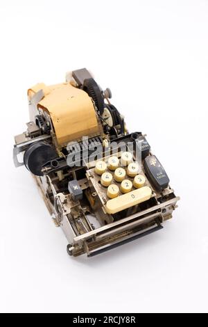 vintage calculator adding machine without case against white studio ...