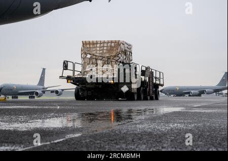 U.S. Airmen prepare to load a K-loader onto a C-17 Globemaster III at ...