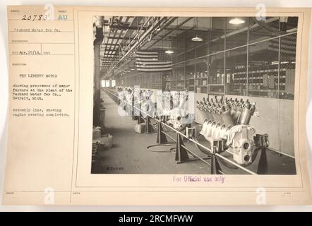 The image depicts the assembly line of Liberty engines at the Packard ...