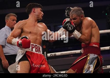 Gabriel Corzo (right) and Josh Kelly in action during the WBO ...