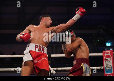 Gabriel Corzo (right) and Josh Kelly in action during the WBO ...
