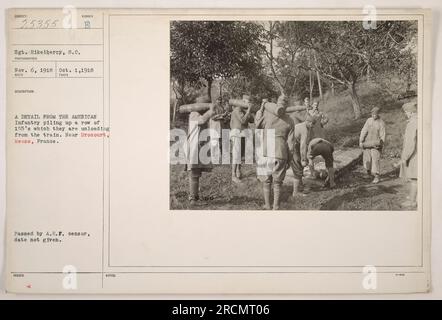 An ammunition loading station. Soldiers loading shells onty rail ...