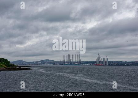 Jack Up Oil Rigs and the Fred Olsen Windcarrier Vessel alongside the ...