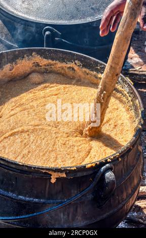 Traditional African corn meal pap staple food, fried chicken and tomato ...