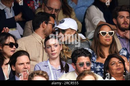 Jonathan Bailey and Ariana Grande alongside Andrew Garfield (right ...