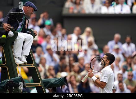Chair Umpire, Fergus Murphy speaking with Novak Djokovic during the ...