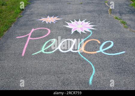 An inspiring chalk art message "Peace Stock Photo - Alamy