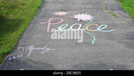 An inspiring chalk art message "Peace Stock Photo - Alamy