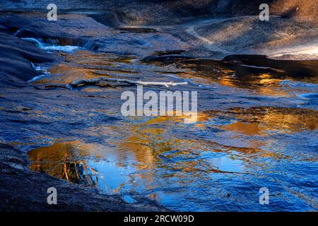 Sunset colours reflected onto waters of Bald Rock Creek, The Junction ...