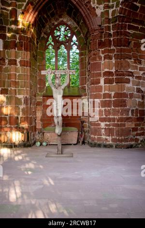 Jesus in a red bricks chapel Stock Photo - Alamy