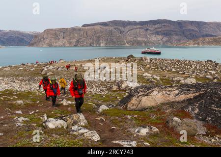 Tourists hiking at Kvanefjord, Greenland in July Stock Photo - Alamy