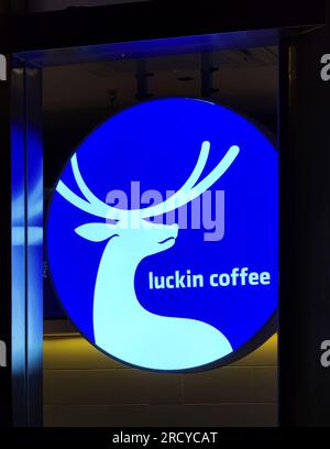 Luckin Coffee shop exterior blue and white logo sign Stock Photo - Alamy