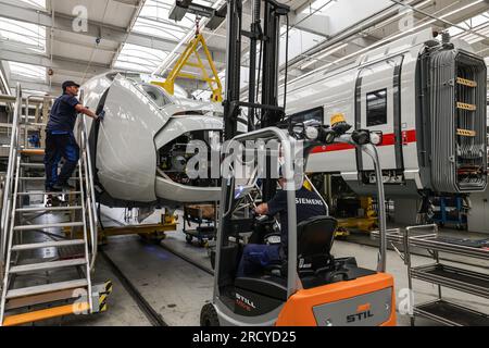 Krefeld, Germany. 17th July, 2023. A Siemens employee welds a component ...