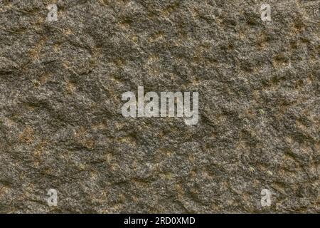 Cream coloured bumpy stone background with cracks a fissures Stock ...
