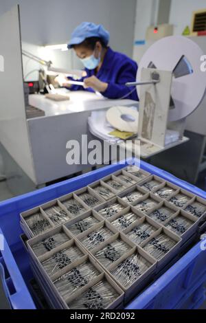 BINZHOU, CHINA - JULY 17, 2023 - A worker produces high-voltage silicon ...