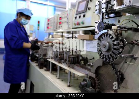 BINZHOU, CHINA - JULY 17, 2023 - A worker produces high-voltage silicon ...