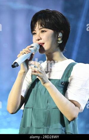 Chinese singer Yu Kewei performs during the closing ceremony of the ...