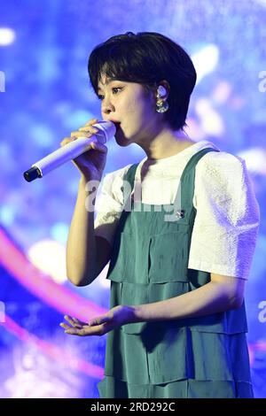 Chinese singer Yisa Yu performs at a beer music festival in Suzhou City ...