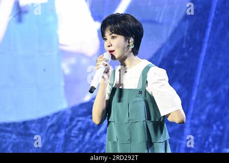 Chinese singer Yisa Yu performs at a beer music festival in Suzhou City ...