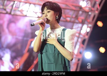 Chinese singer Yisa Yu performs at a beer music festival in Suzhou City ...
