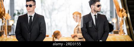 personal security, handsome bodyguards in suits and sunglasses ...