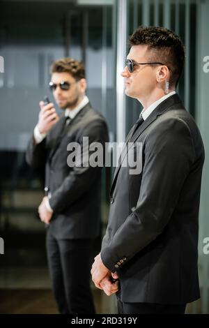 bodyguard service, private security, professionals in suit and ...