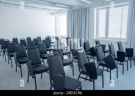 Clear conference room, classroom. White brick wall Stock Photo - Alamy